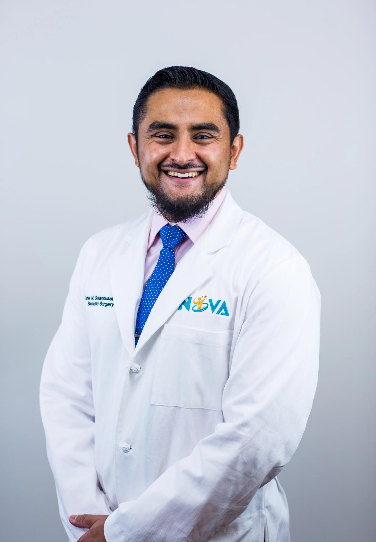 Taher Gulamhusein, MD