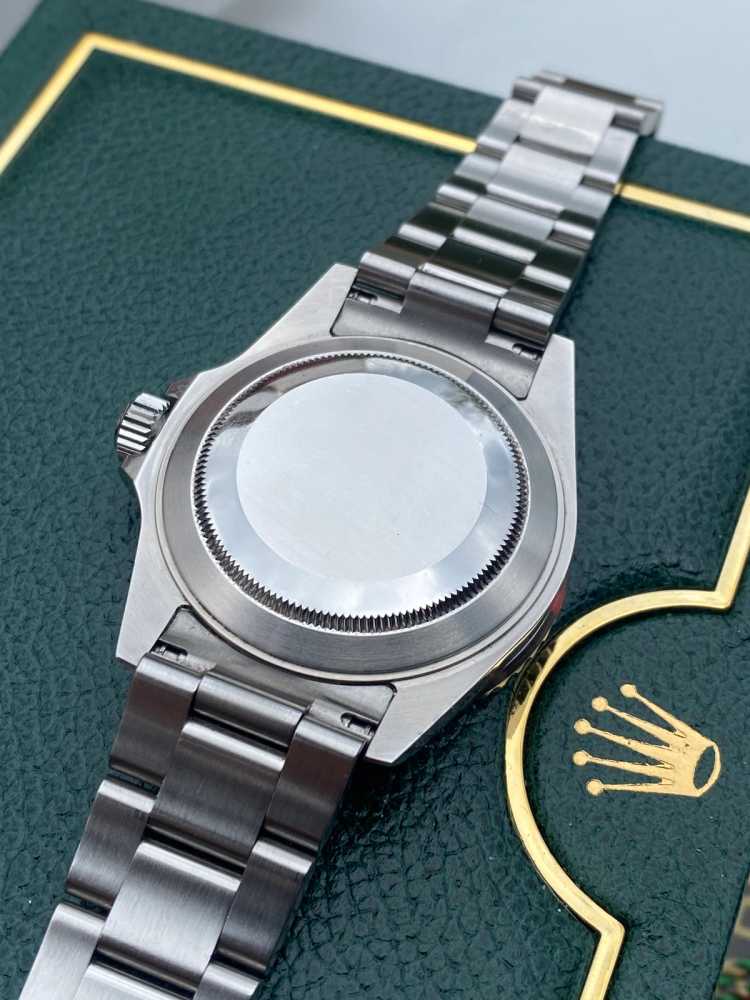 Rolex Submariner "Flat 4" 16610LV Black 2003 with original box and papers