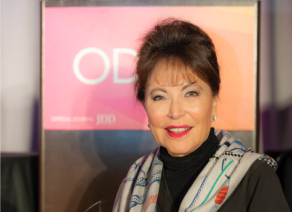 Susan Weinkle, M.D., presented JDD outstanding educator award