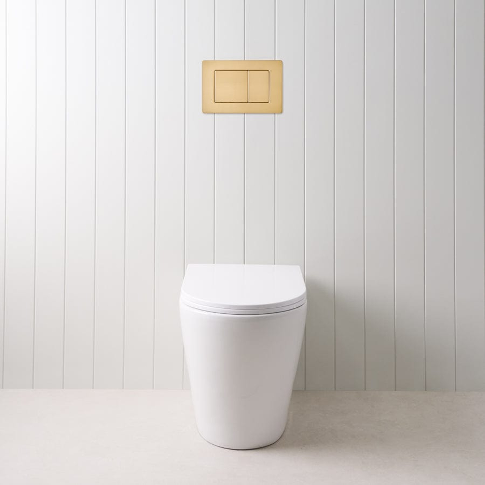Angled In-Wall Toilet With Rectangle Brushed Brass Buttons | TileCloud