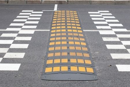 Trip and Fall in Parking Lot Attributed to Improper Speed Bump