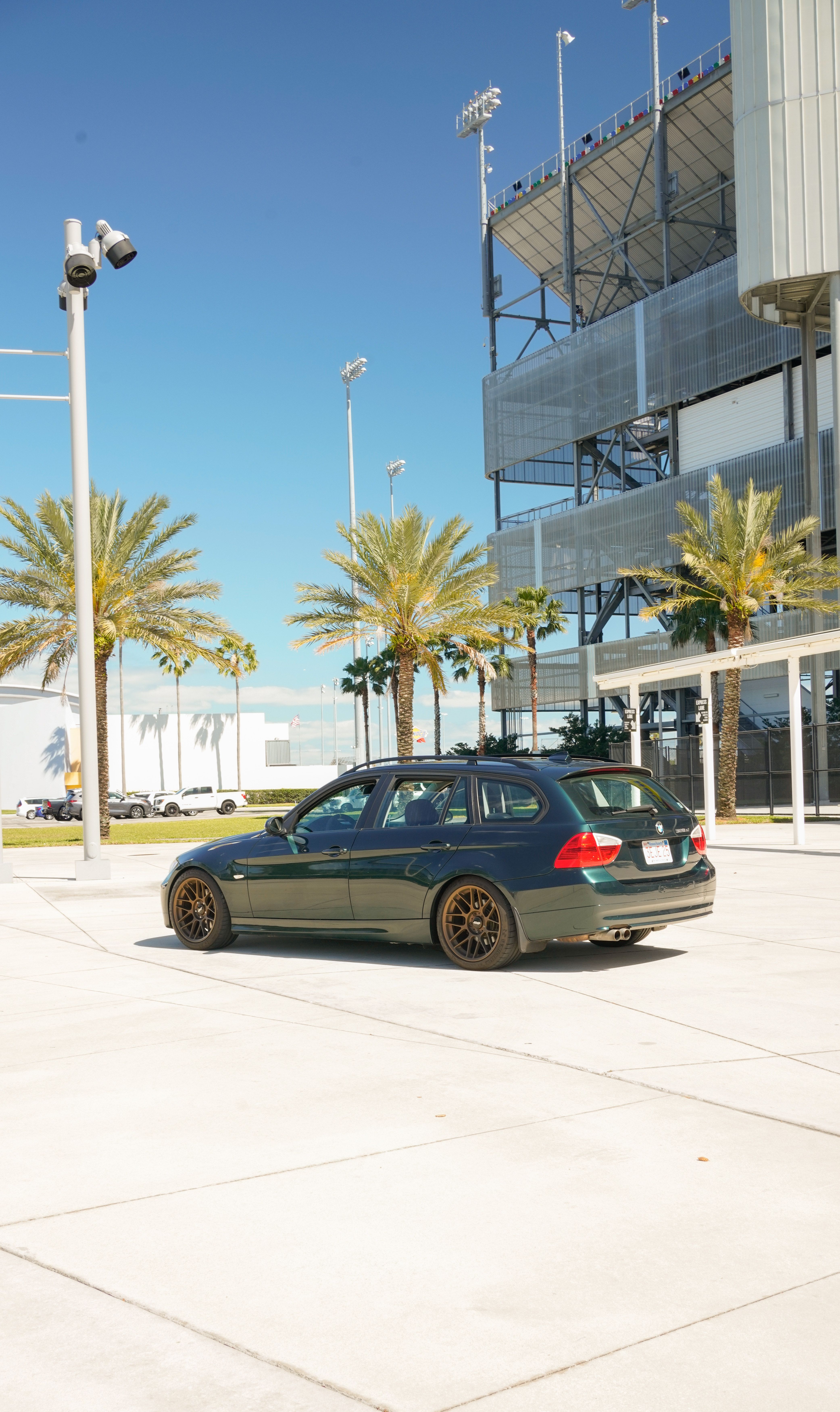 BMW E91 Wagon 3 Series with 18" ARC-8 Wheels in Satin Bronze