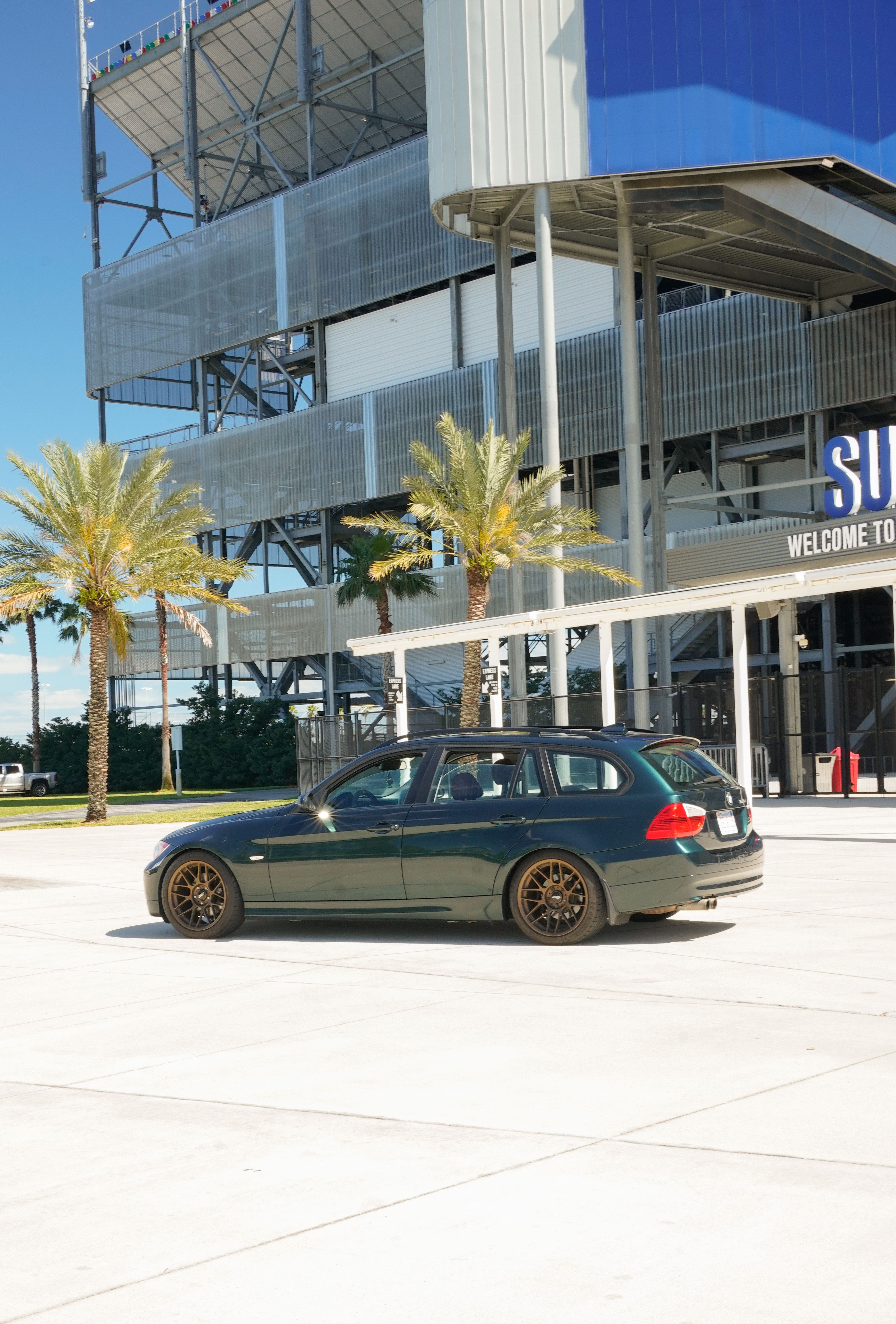 BMW E91 Wagon 3 Series with 18" ARC-8 Wheels in Satin Bronze