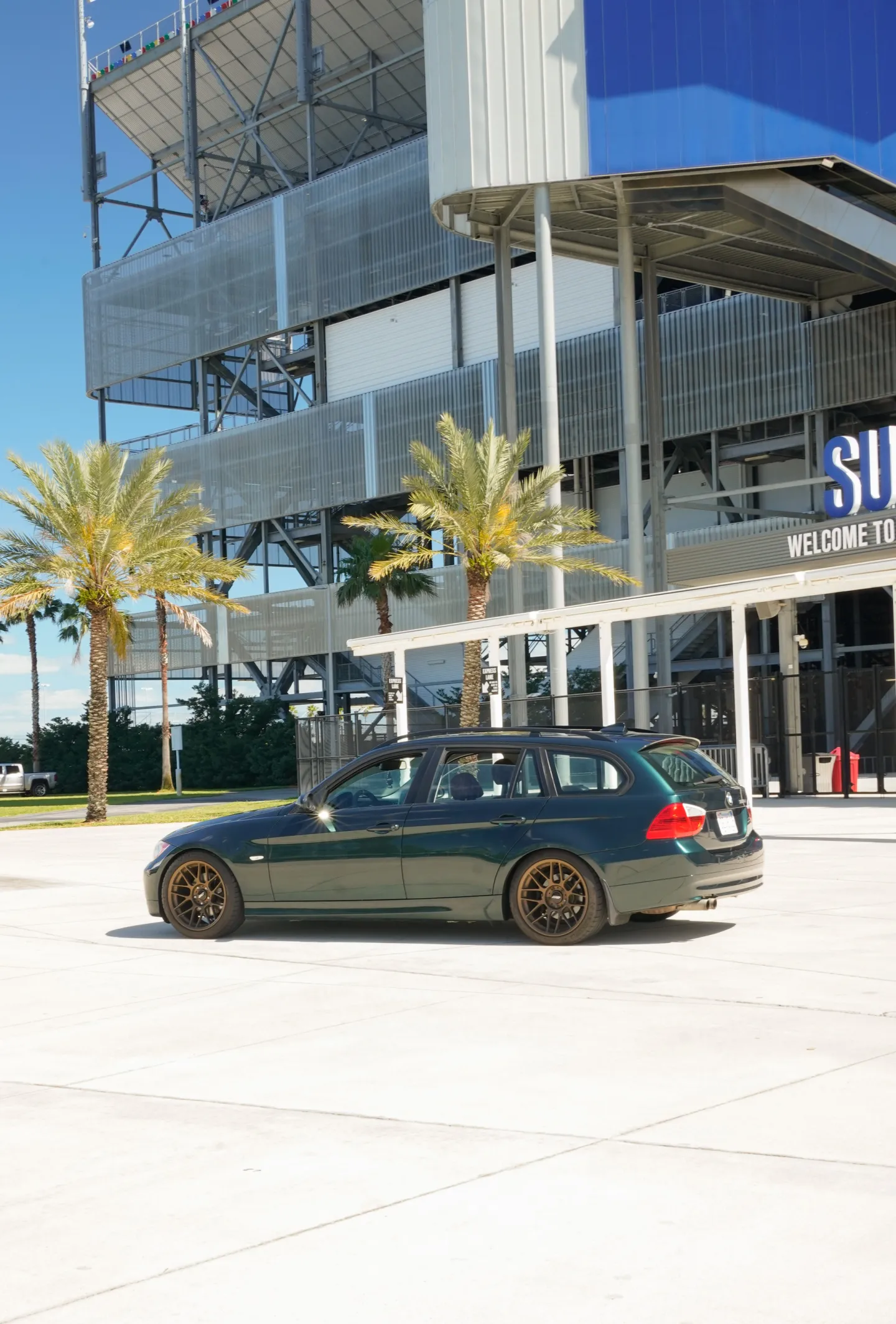 BMW E91 Wagon 3 Series with 18" ARC-8 Wheels in Satin Bronze