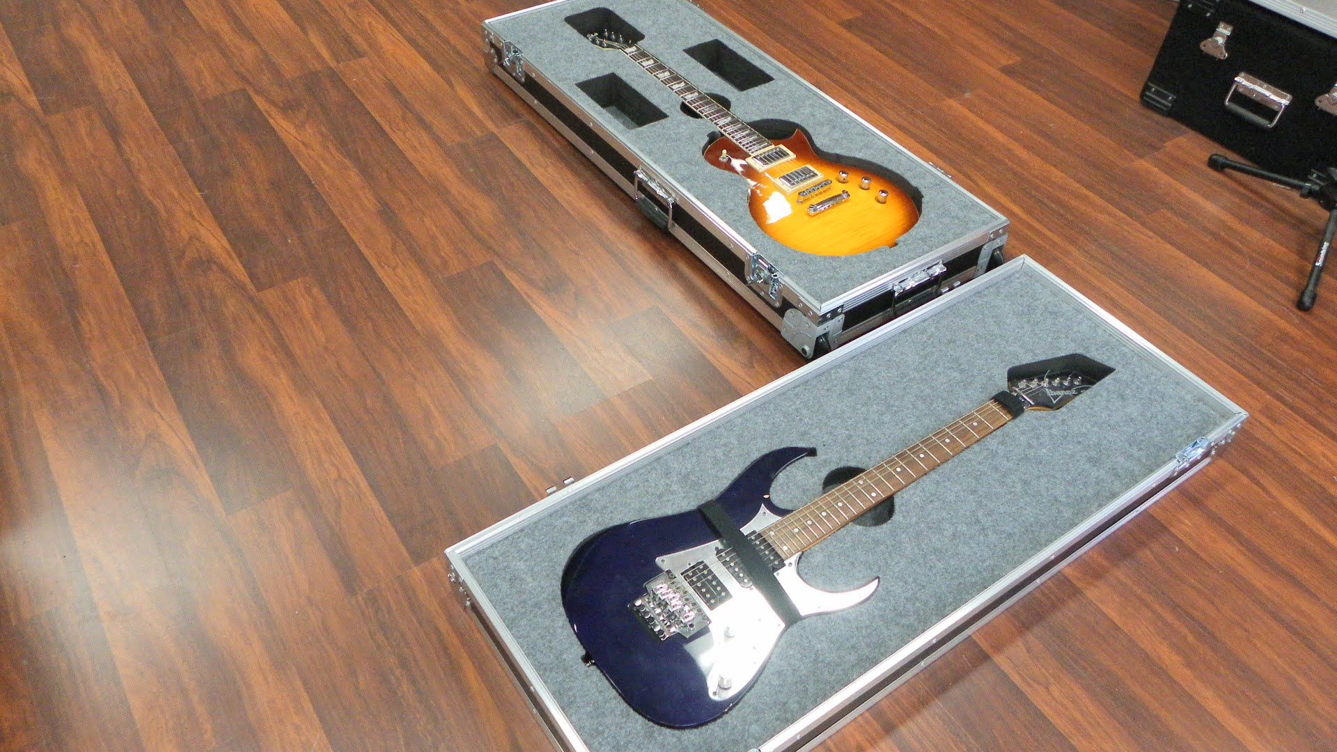 Custom Double Guitar Case Laying On Top Of Each Other | Protectapack