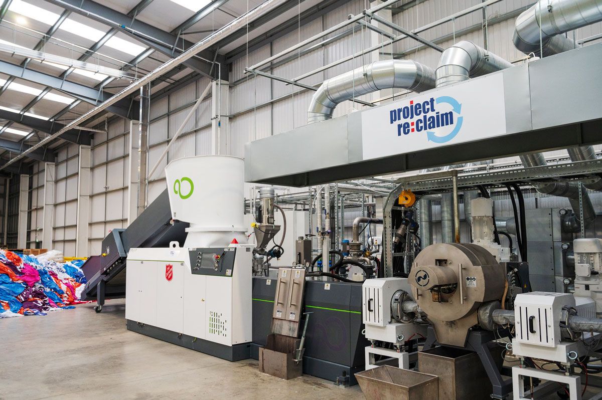 First-of-its-kind polyester recycling plant starts processing textile ...
