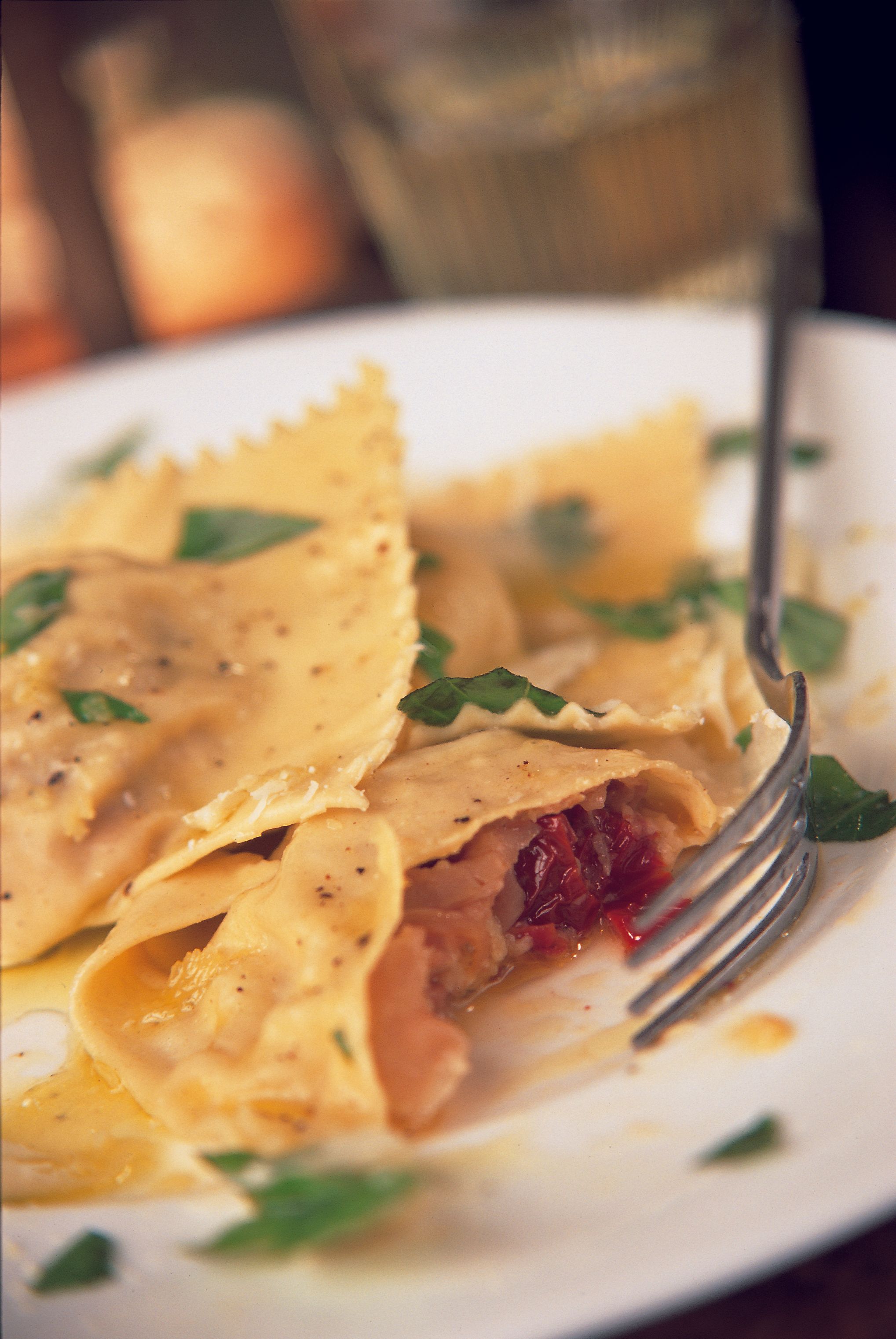 Ravioli with prosciutto, sun-dried tomatoes, basil & mozzarella