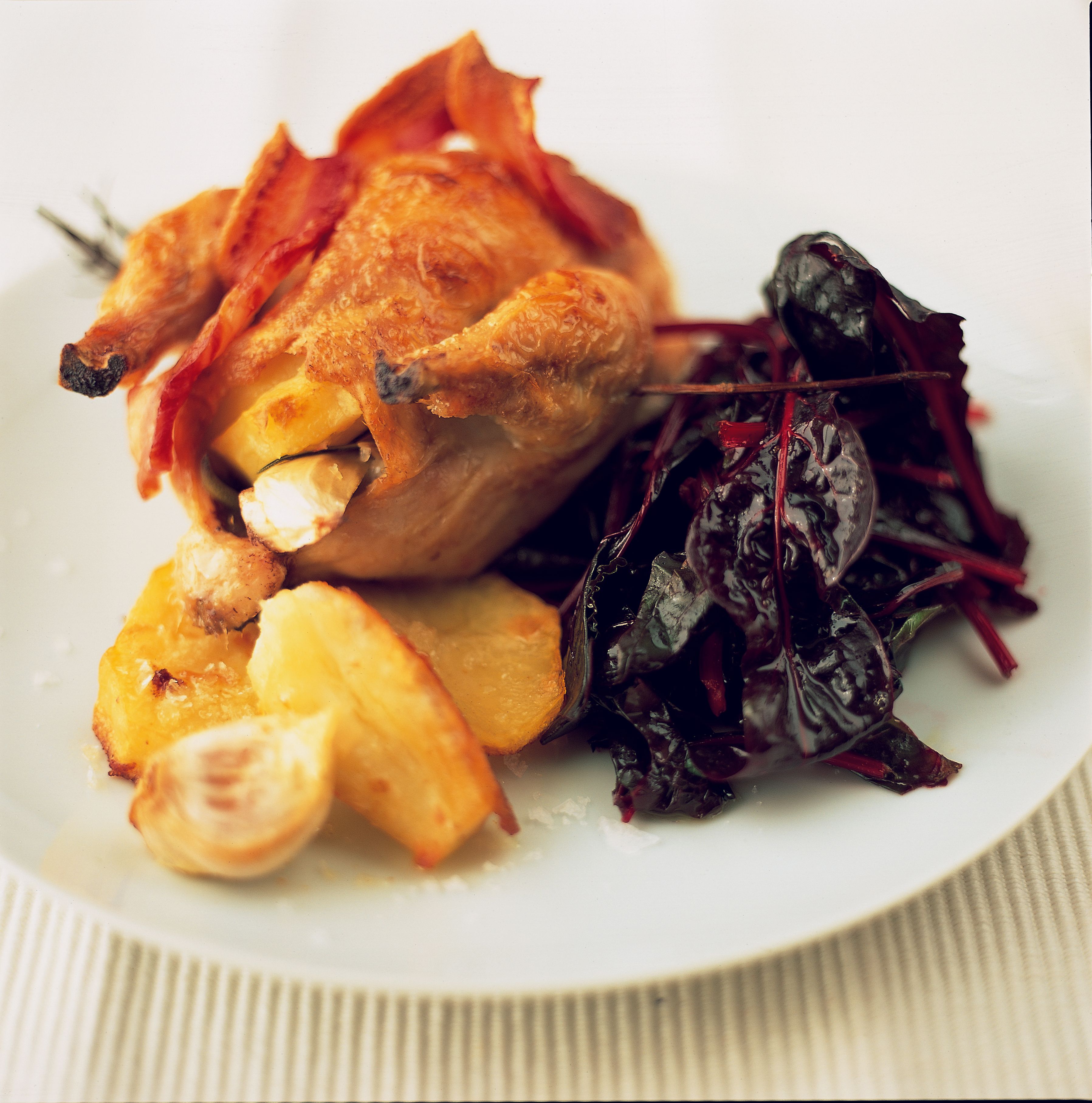 Roasted Hamilton poussin wrapped with streaky bacon & stuffed with ...