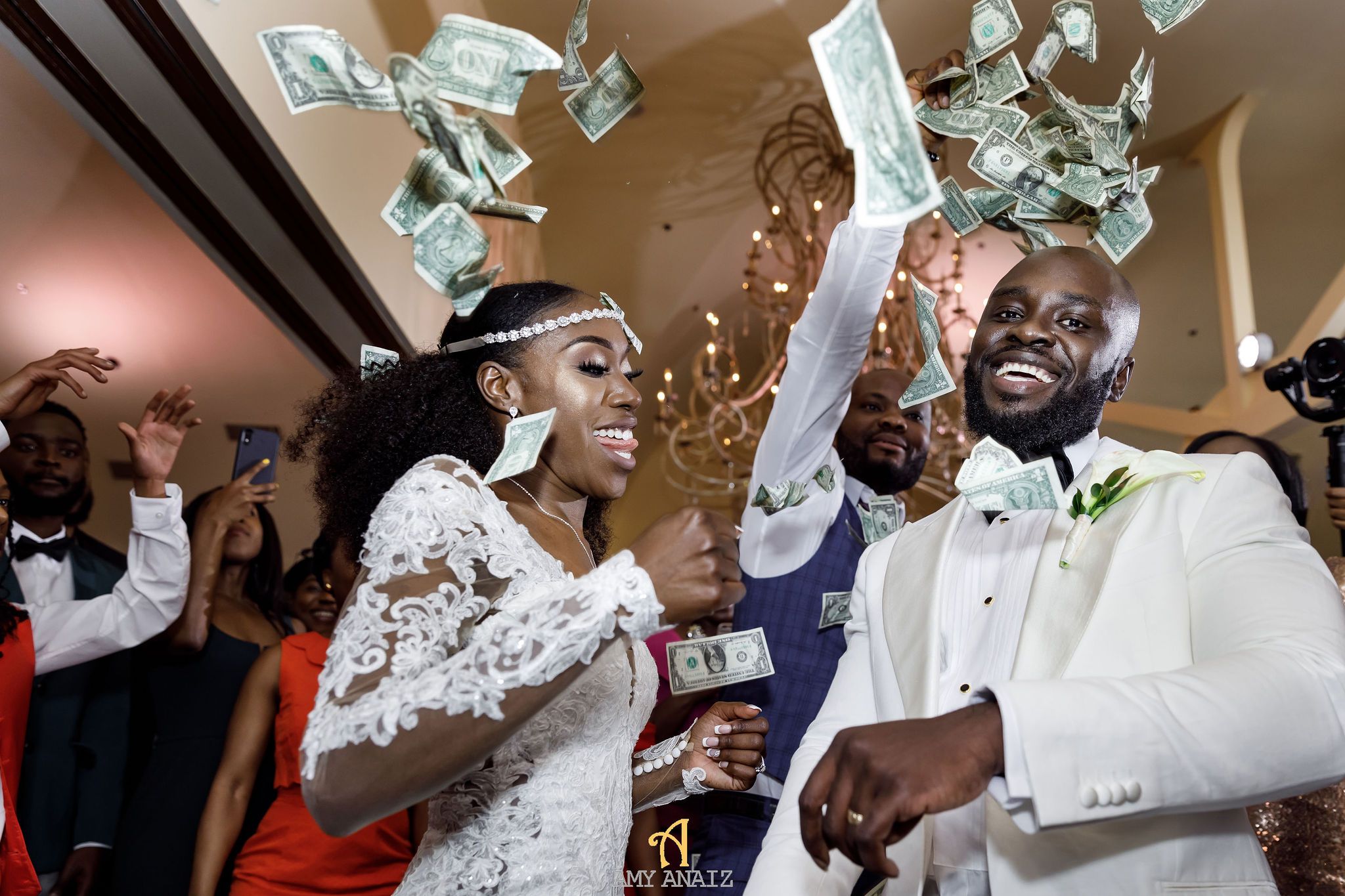 Inawo Magazine - The origin of spraying money at Nigerian parties