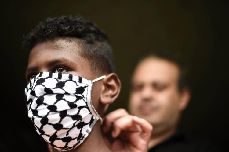 A global pandemic brings new life to Palestinian artist's face masks