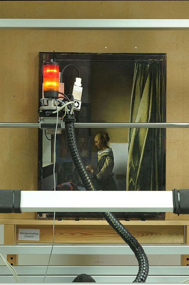 Hidden Cupid resurfaces in one of Vermeer’s best-known works after two ...