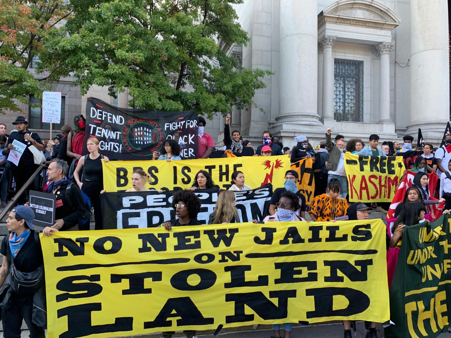 Nearly 500 protesters stage Anti-Columbus Day history tour at New York ...