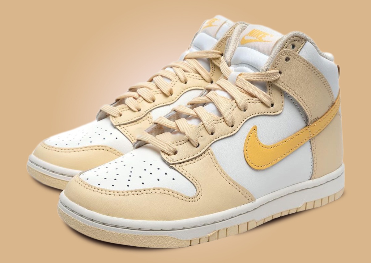 This Women’s Exclusive Nike Dunk High Comes In Pale Vanilla Topaz Gold
