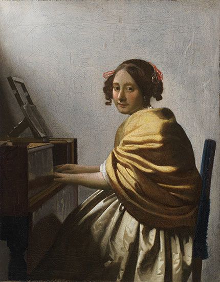 A Young Woman Seated at the Virginals by Johannes Vermeer