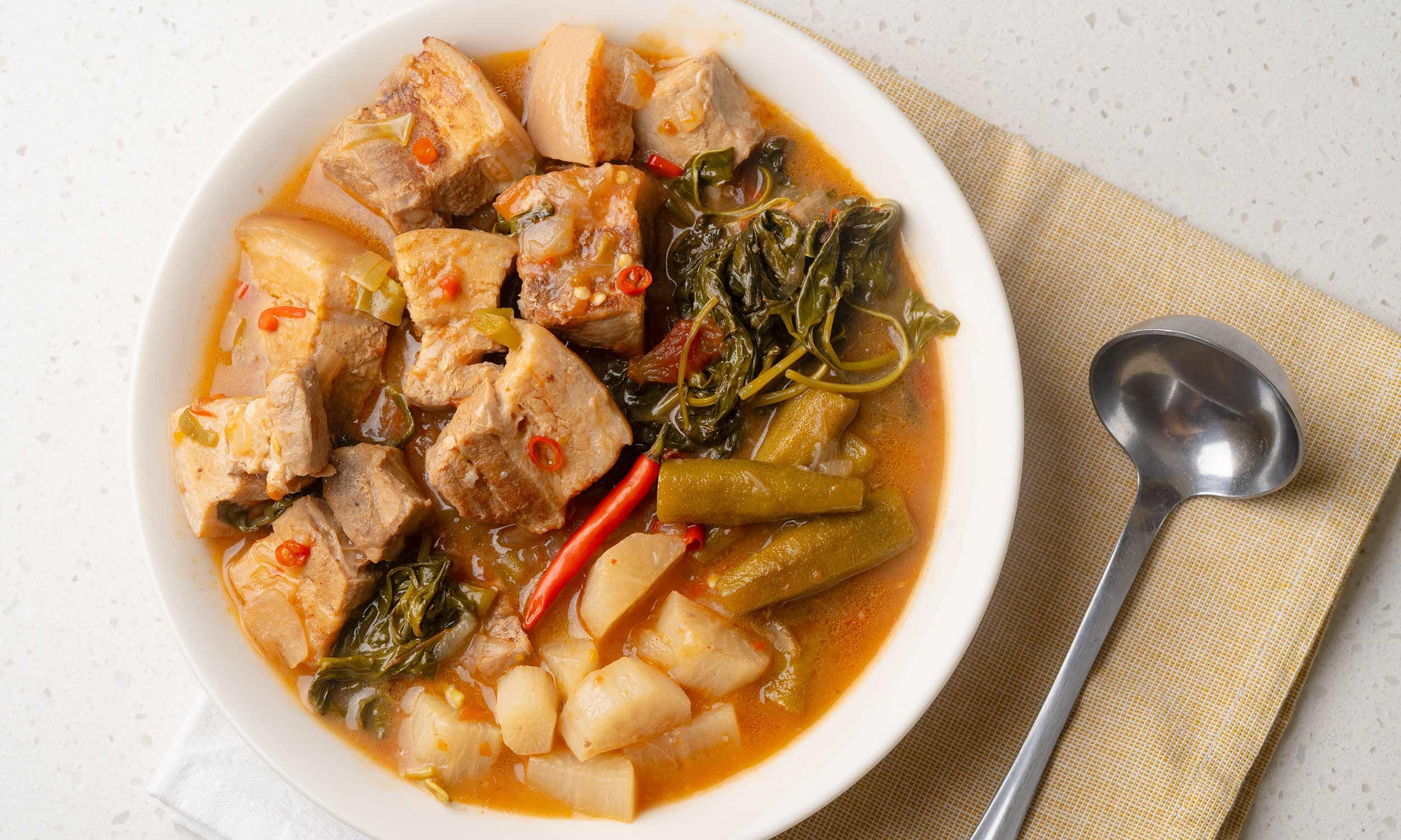 Spicy Pork Belly Sinigang (Filipino Sour Soup) Recipe | Pepper.ph