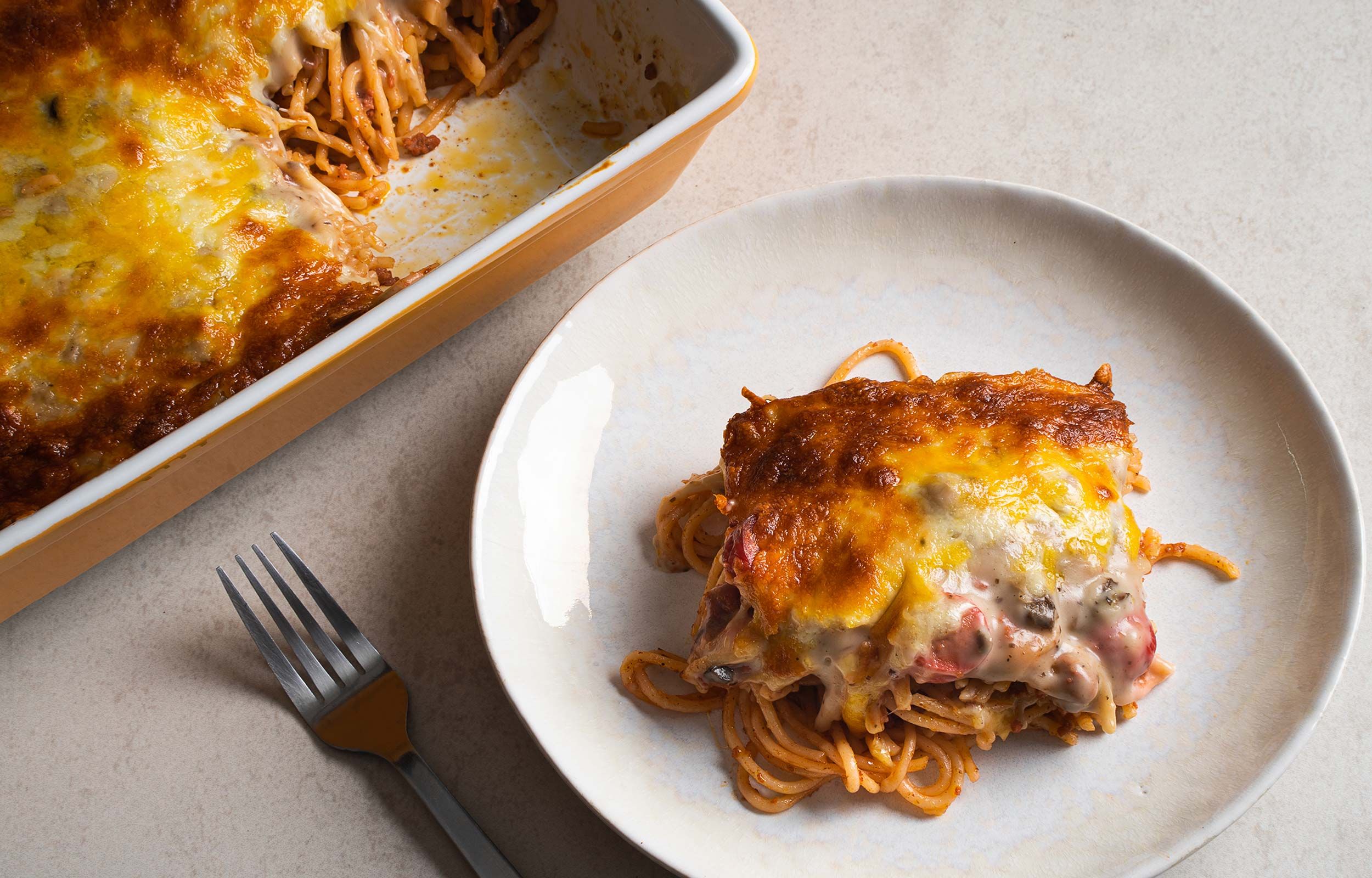 Baked Filipino Spaghetti with Mushroom Topping Recipe | Pepper.ph