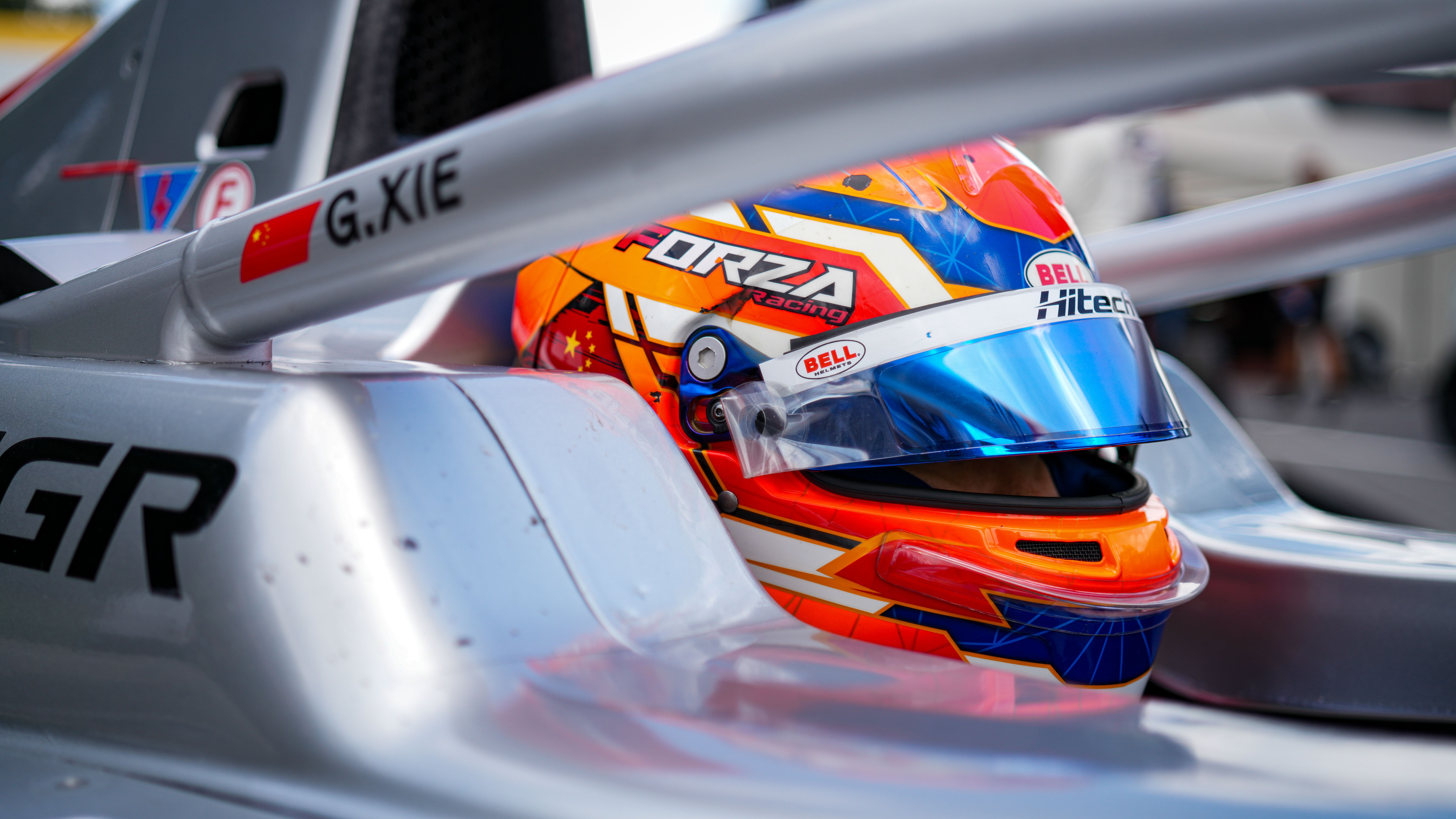 Chinese racer Gerrard Xie talks BYD, fashion, and F1 dreams | Jing Daily