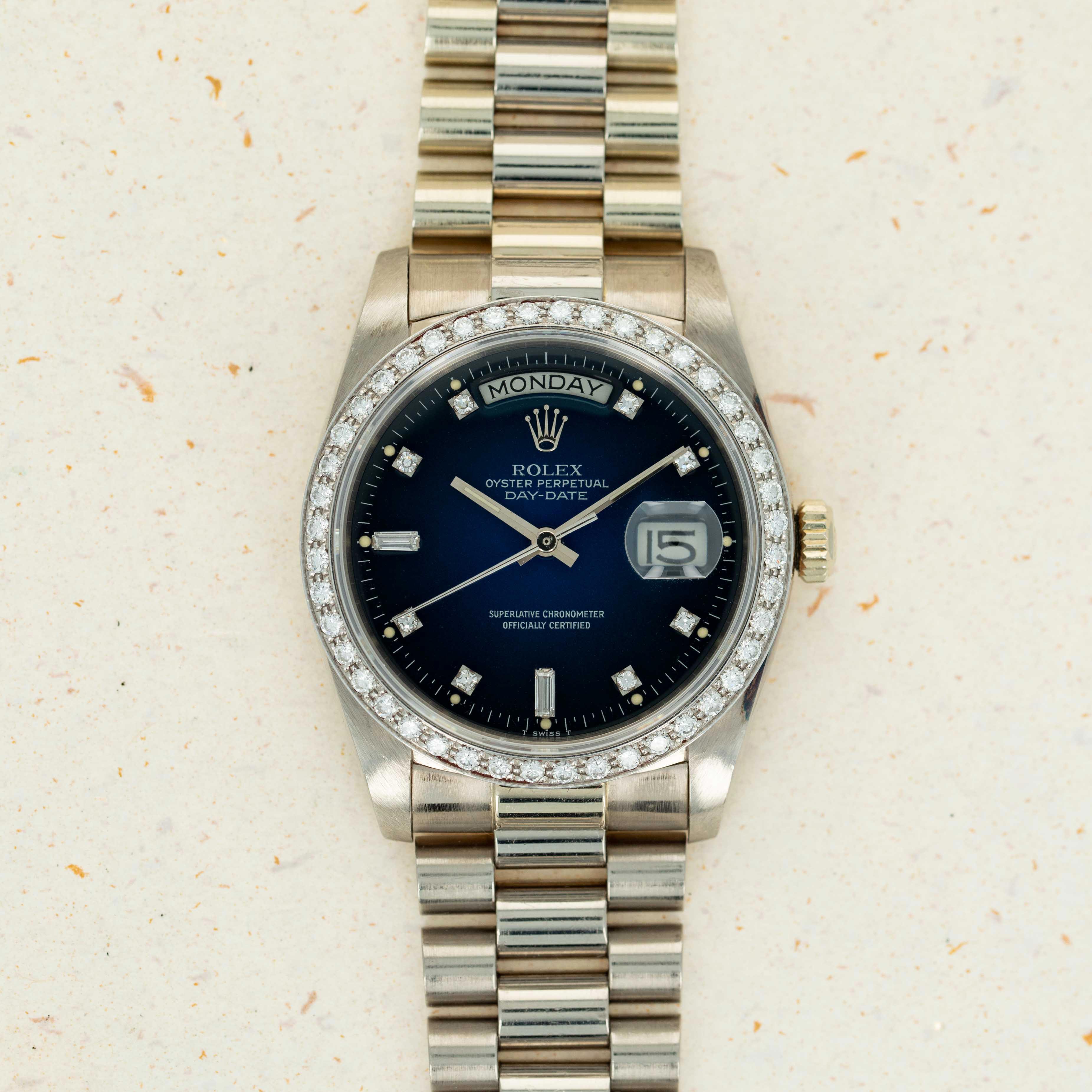 Rolex Day-Date 18049 Diamond Bezel Blue Vignette Diamond Dial 18k WG | Auctions | Loupe This