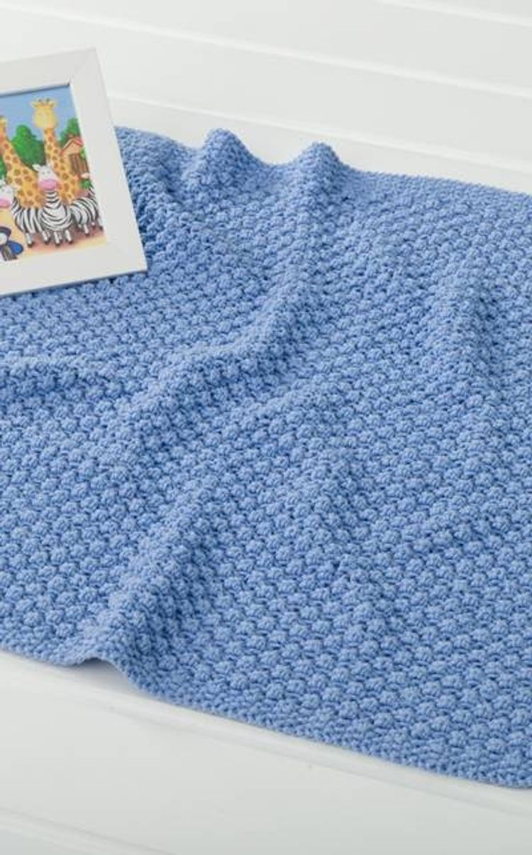 Neulottu vauvan peitto (arkistomalli)