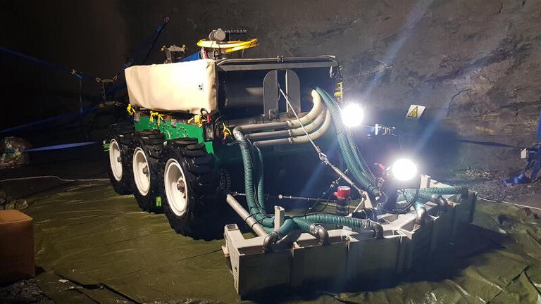 Cleaning inaccessible water reservoirs using remotely operated vehicles ...