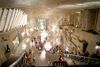 Visitors walk around an old salt mine underground.