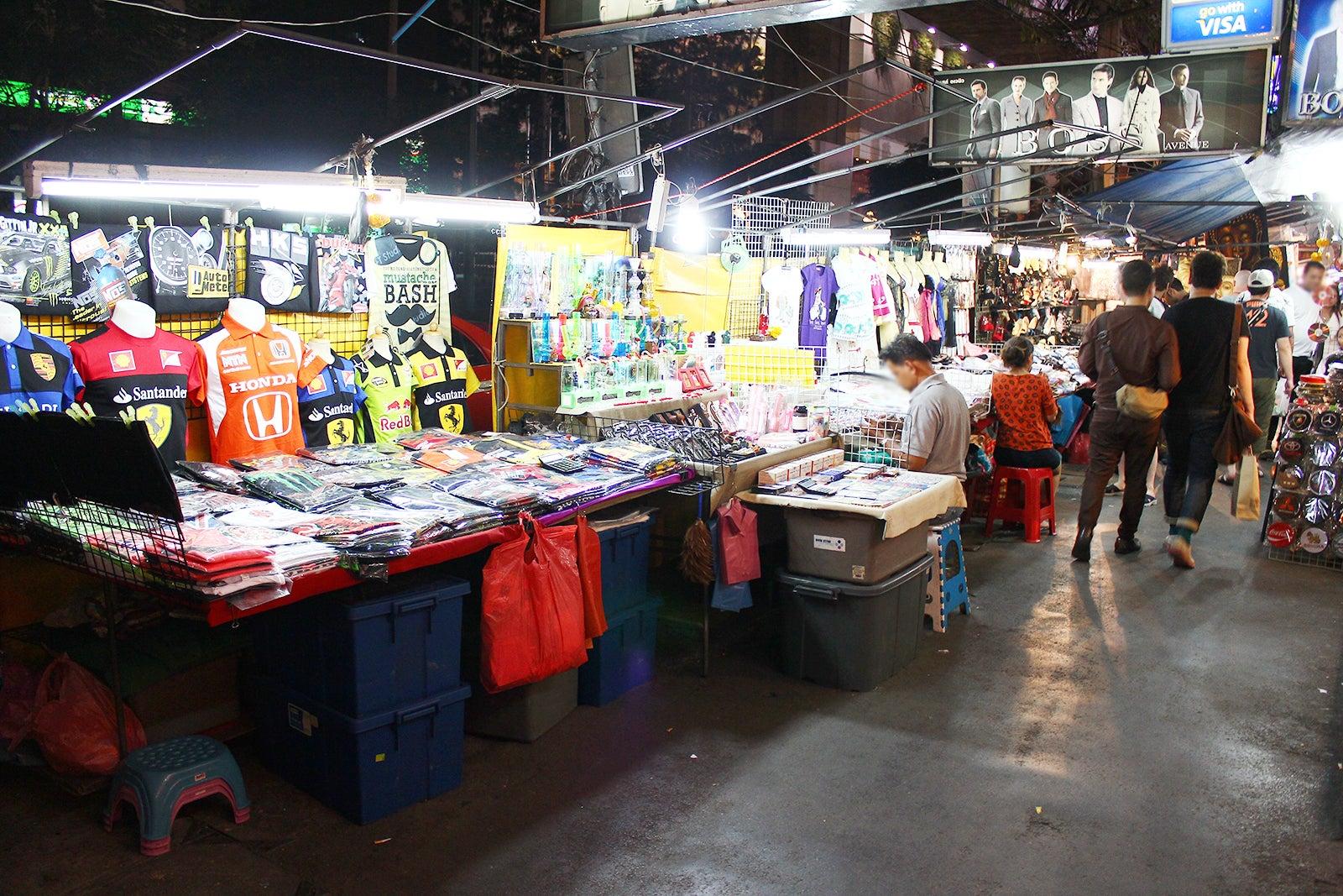 Vendors inside a market.
