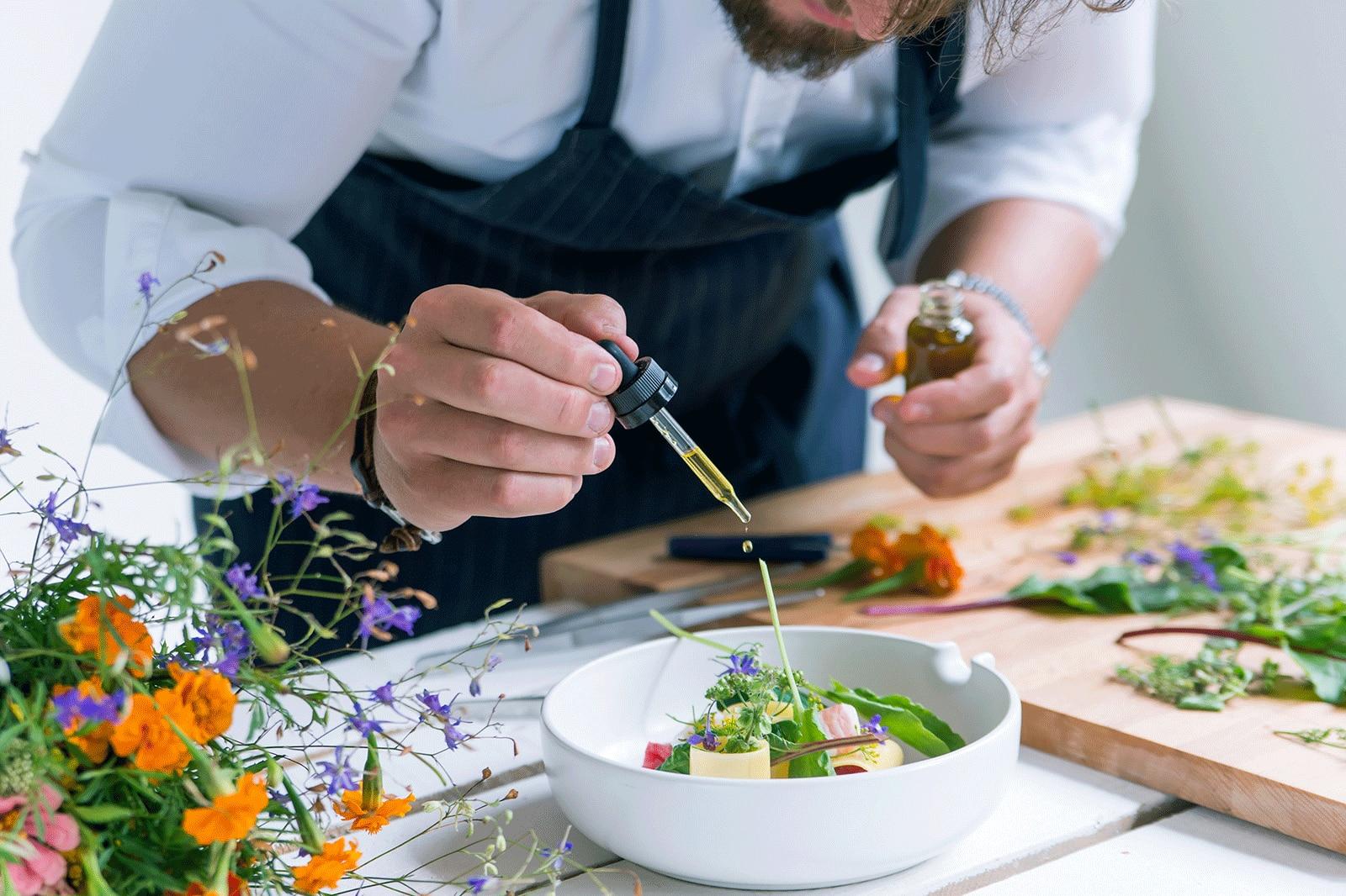 Chef prepares a salad.