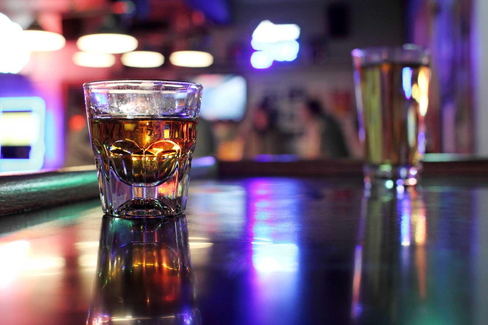 Glasses on a bar.