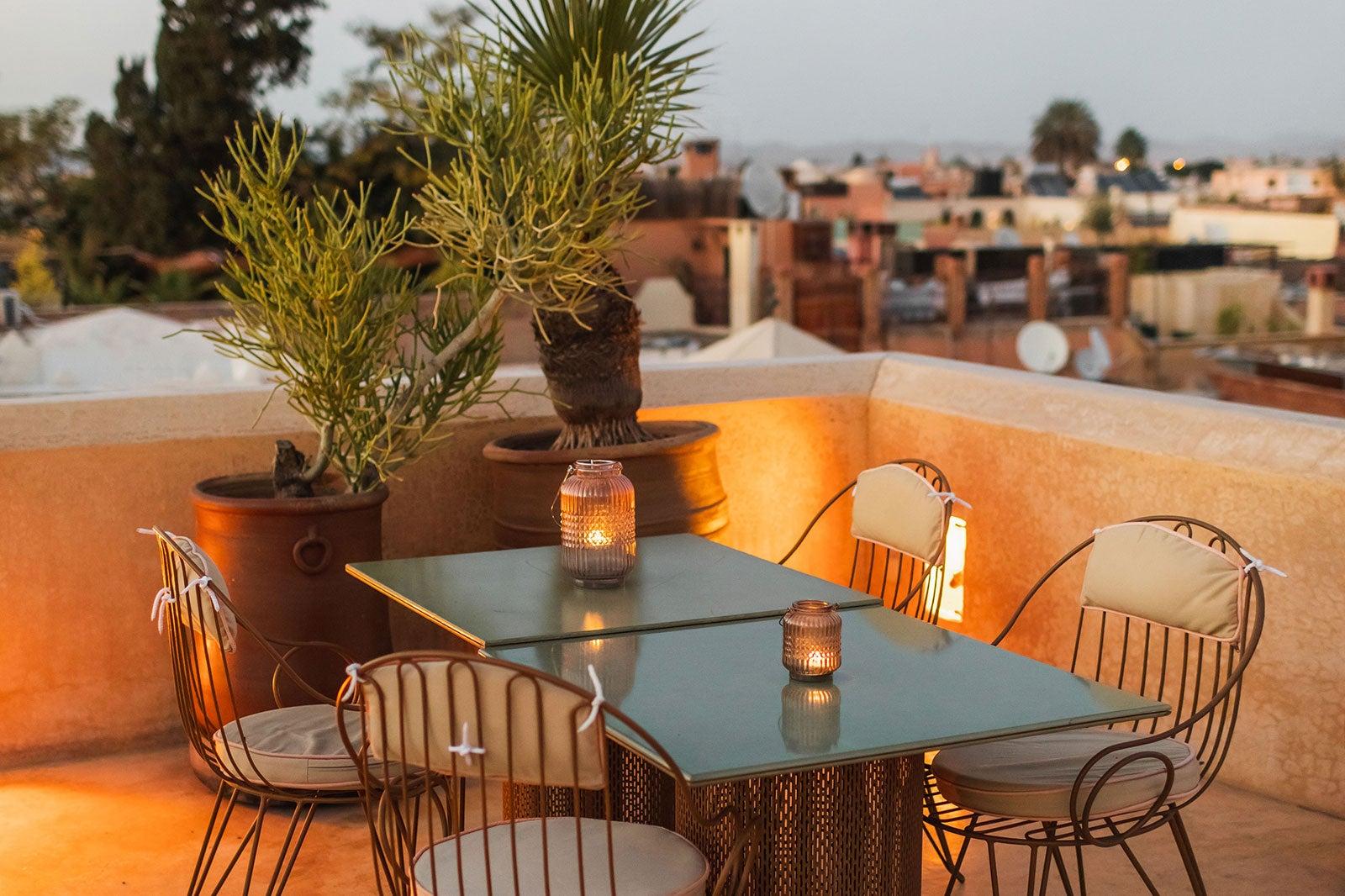 Rooftop patio table with a view.