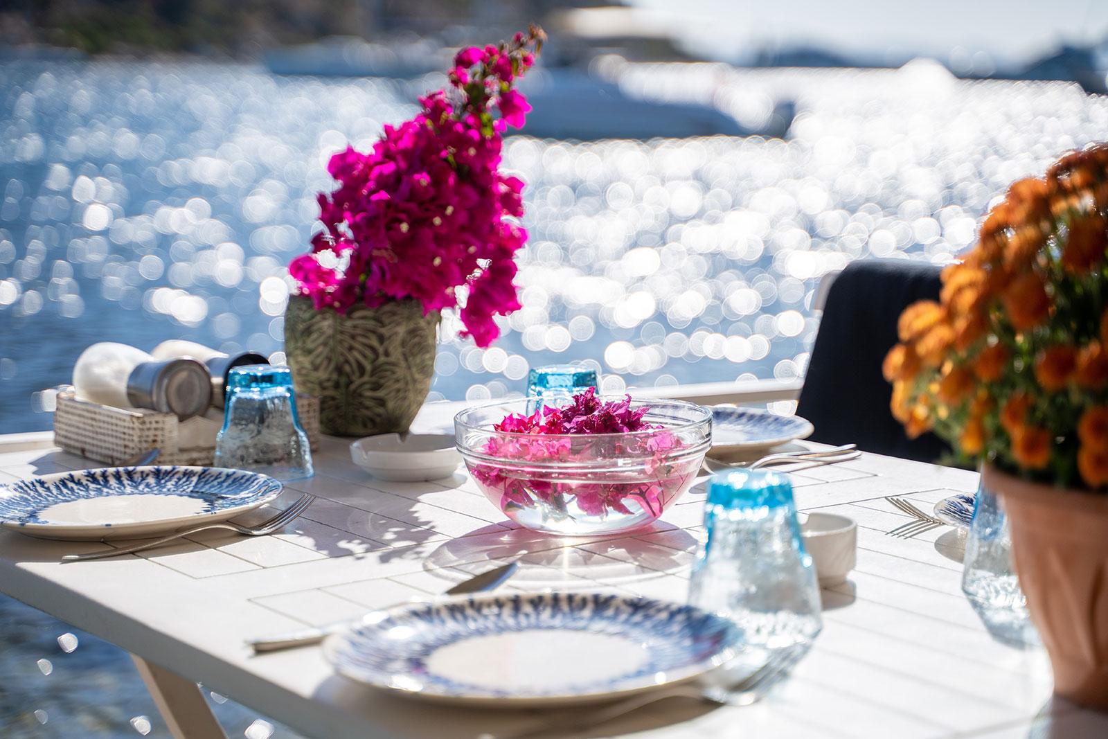 Table and plates at outdoor seating.