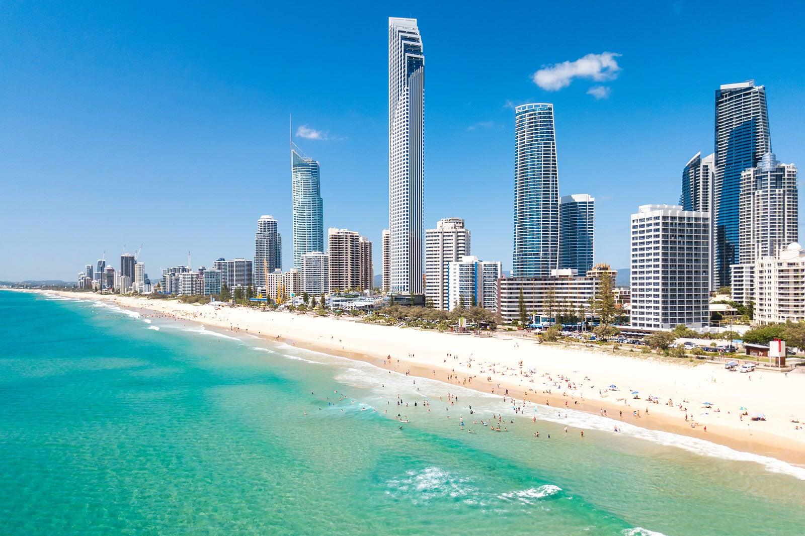 Beach with cityscape behind it on the Gold Coast.