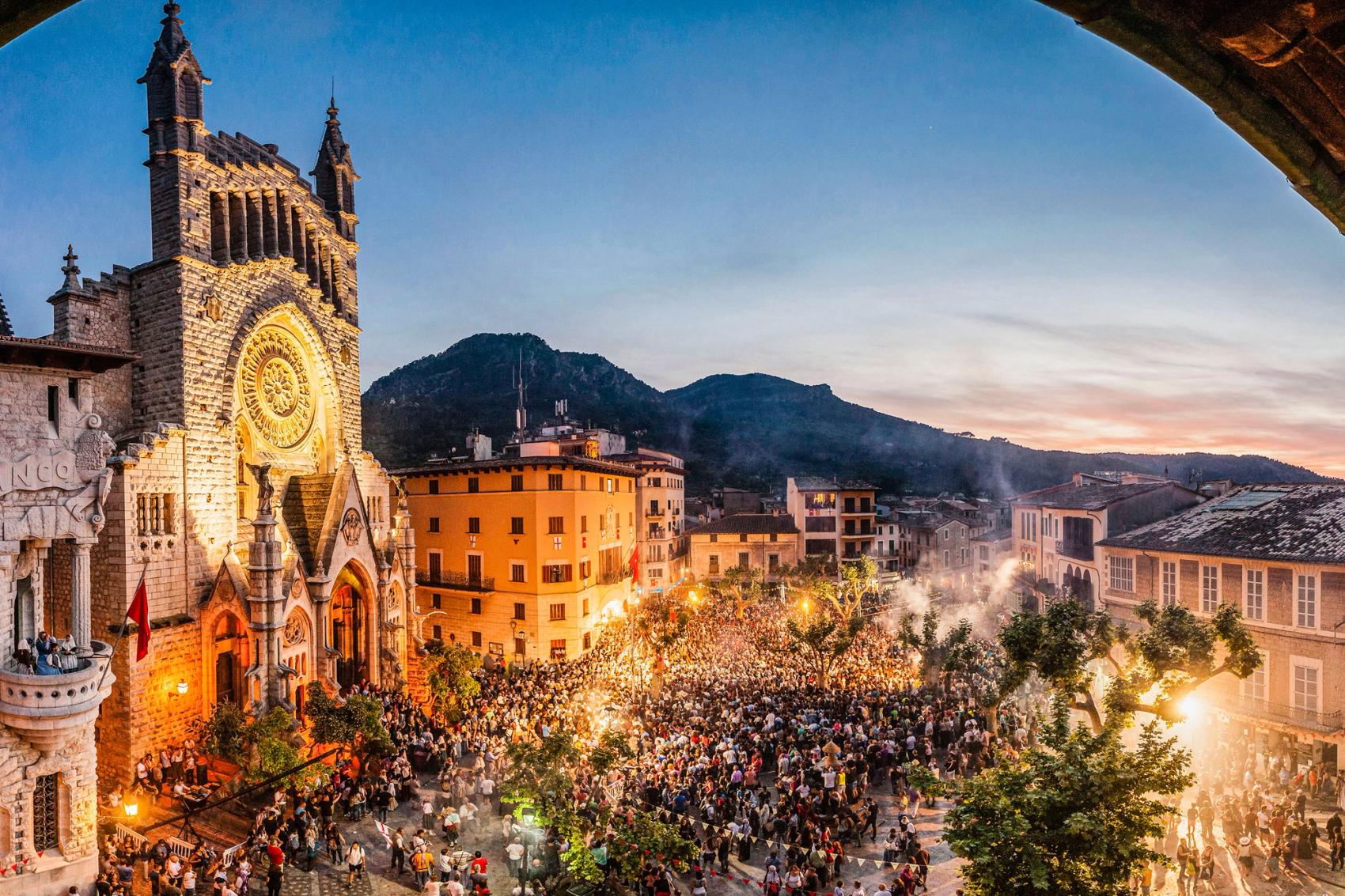 Crowds celebrate Es Firo festival in Mallorca, Spain.