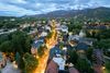 A nighttime overhead view of a mountain resort town.