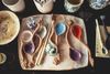 Ceramic spoons on a tray.