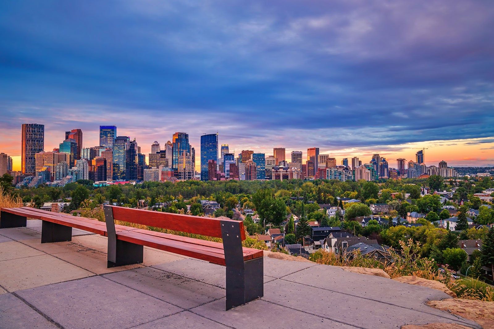 Public benches and the skyline of Calgary. 