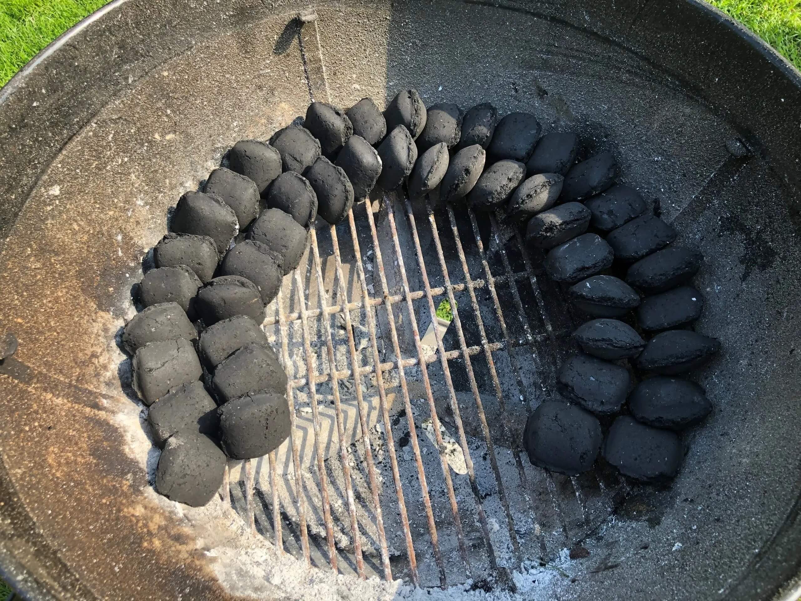 The snake method for setting up charcoal in a barbecue