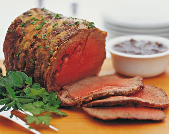 Roast scotch fillet of beef with mushroom sauce and roast potatoes ...