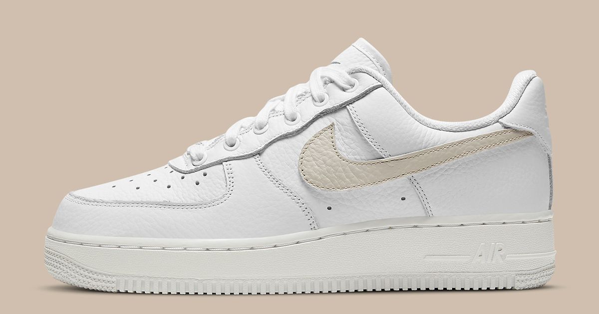 Nike Air Force 1 Low “Light Bone” Surfaces with Stencil Swooshes ...