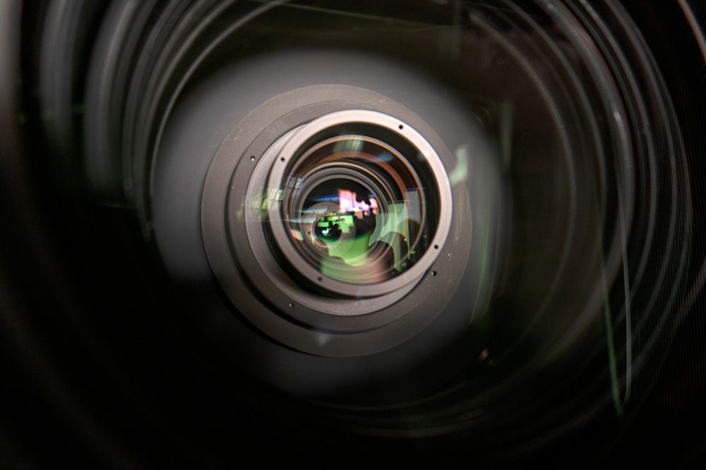 Close-up optical lens for a document verification system. | Optech