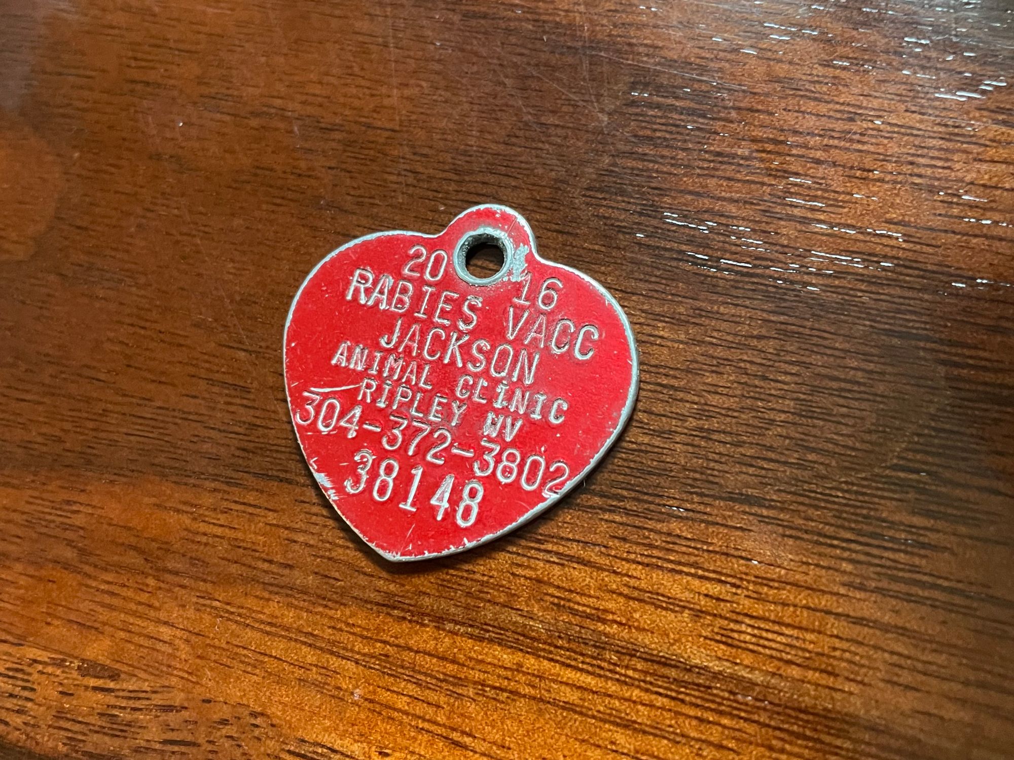 A Diamond and Gold Rabies Tag Bracelet | Page