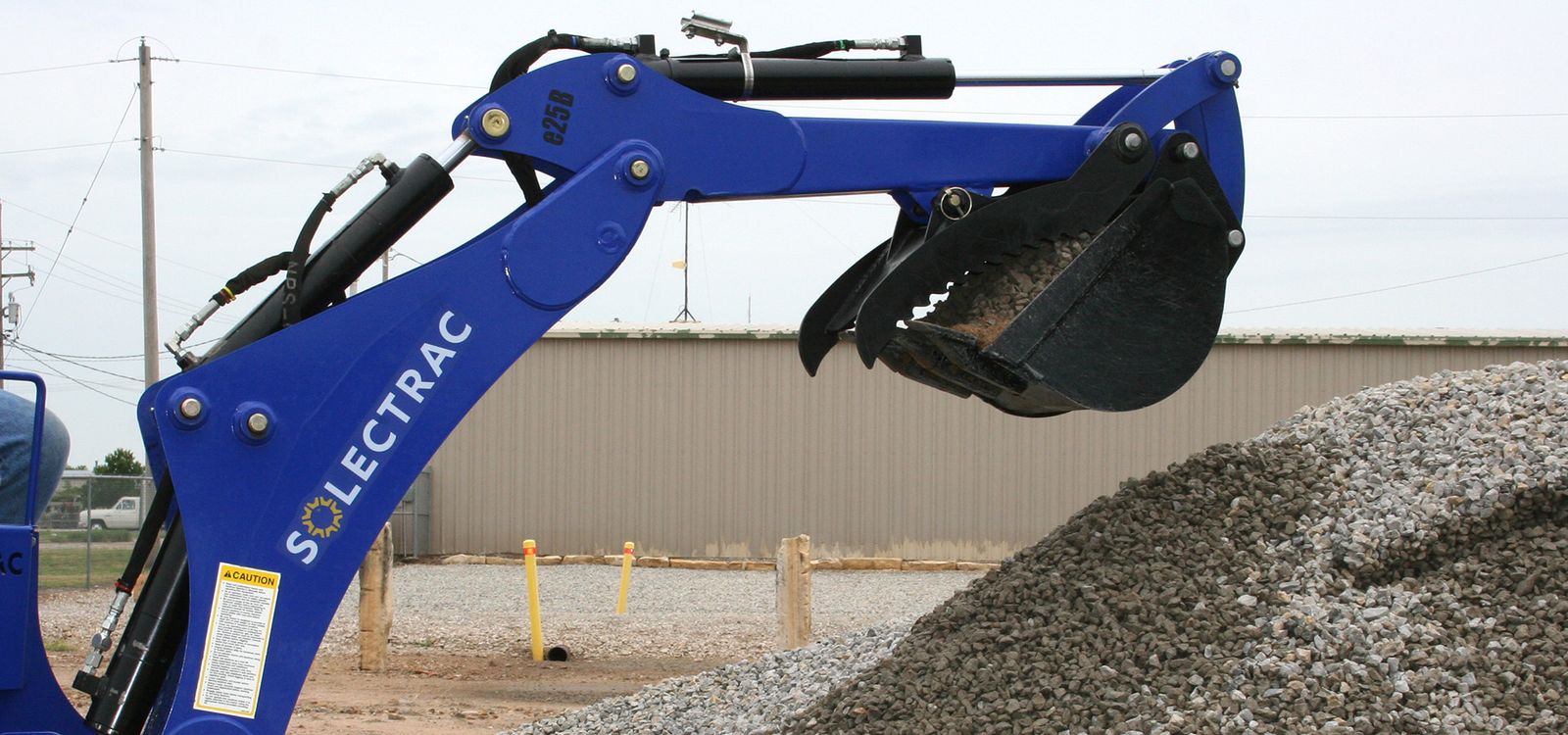 e25 Electric Tractor with Backhoe | Solectrac