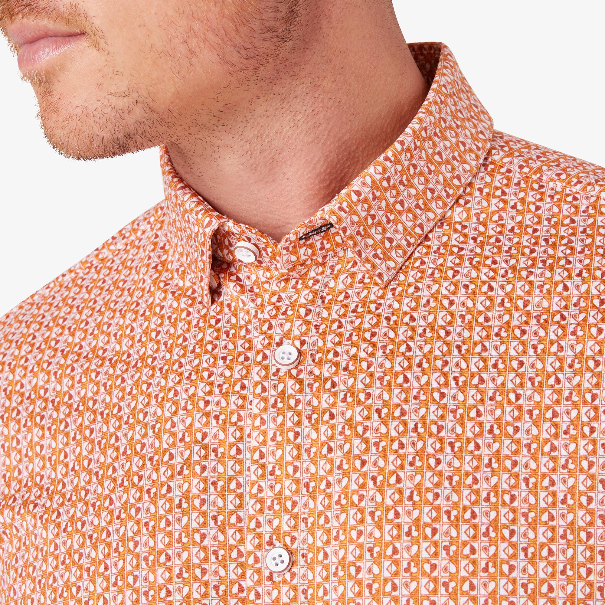 Model is 6’ 2” and is wearing a size medium, with a trim fit