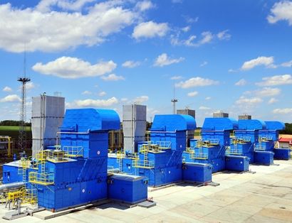 What is a gas turbine on-line washing system?