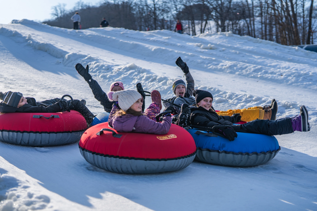 Winter Snow Tubing - Exciting Downhill Family Adventures | Boyne Mountain