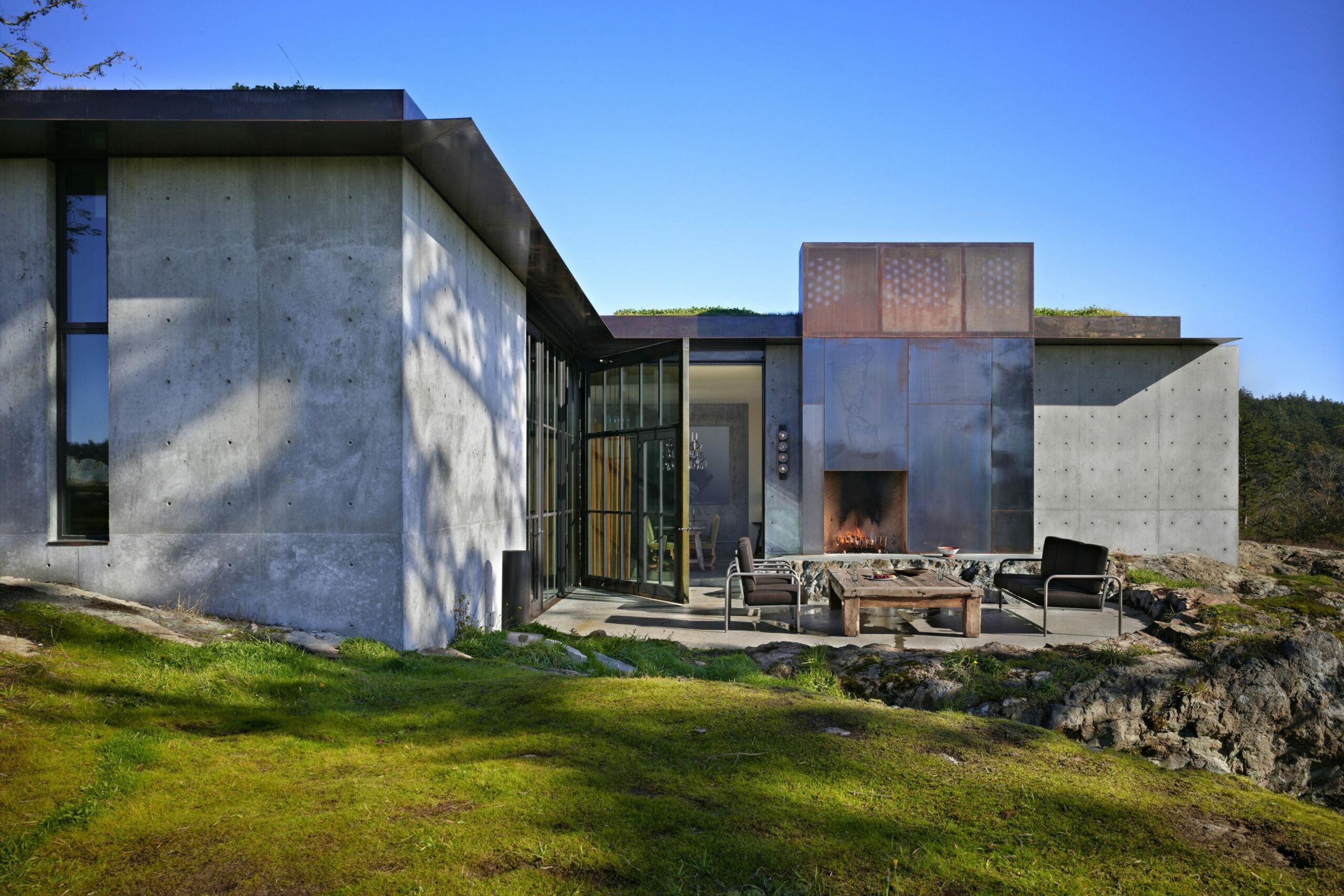 This modern home is carved into the rockface of the Washington ...