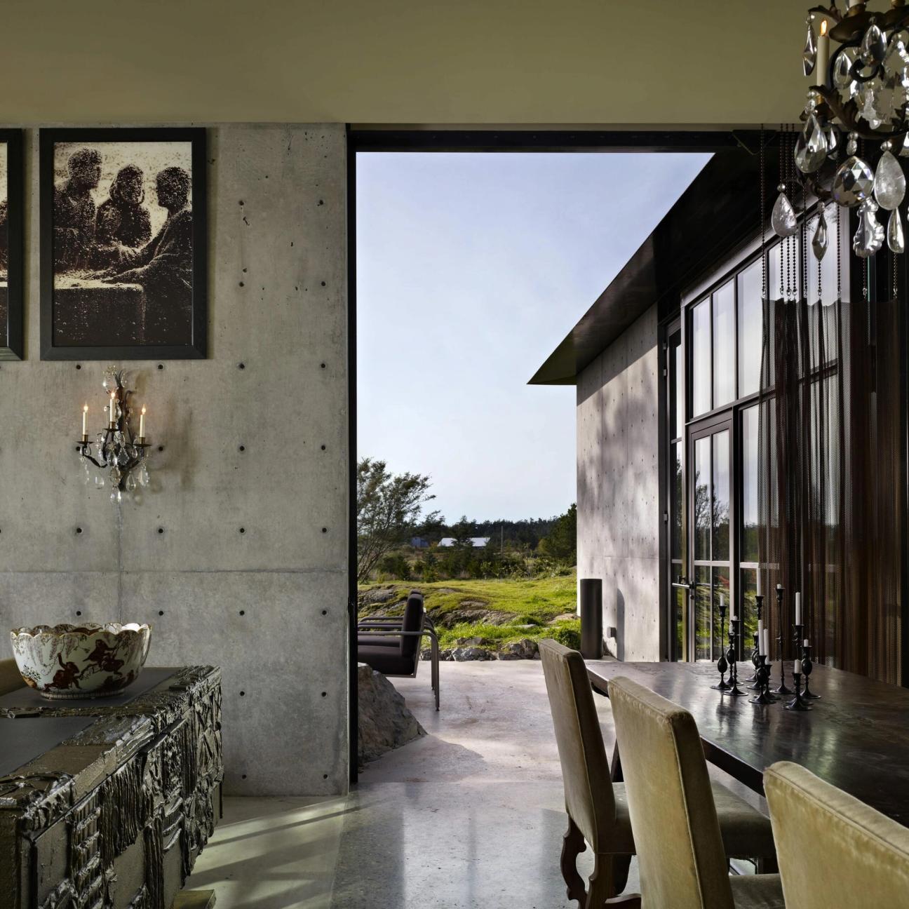 This modern home is carved into the rockface of the Washington ...