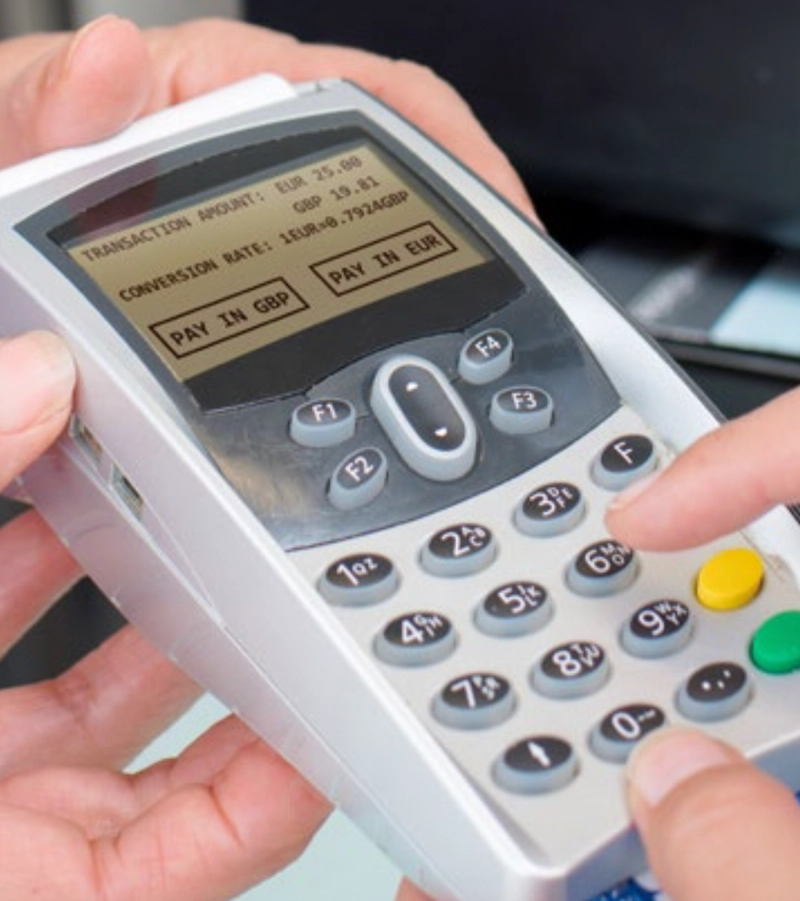 Using ATMs Abroad: Exchange Rates, Fees & Best Debit Cards