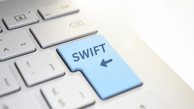 Virement SWIFT : Définition, Délais & Frais